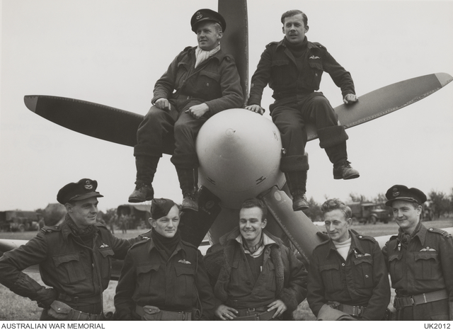 HOLLAND. 1944-10-16. GROUP OF RAAF PILOTS IN SPITFIRE NO. 130 SQUADRON ...