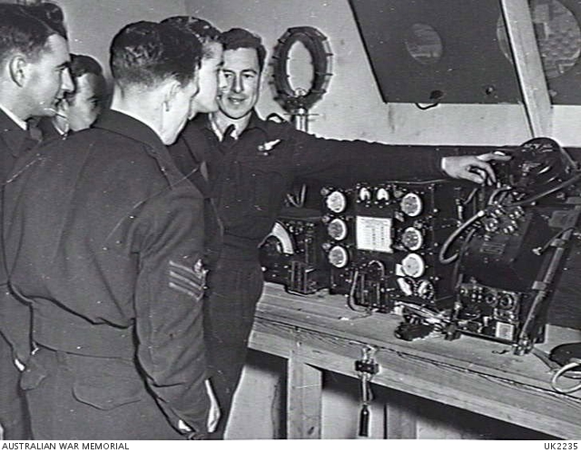 Personnel of No. 467 (Lancaster) Squadron RAAF receiving instructions ...