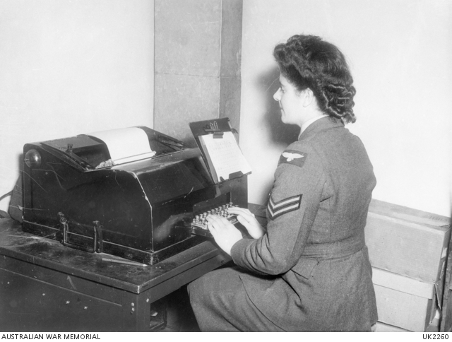 Plymouth, England. 1944-12-19. WAAF operator keeping in touch with ...