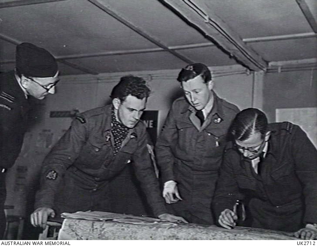 RAAF crewmen Warrant Officer (WO) Rutter and Flight Sergeant (F Sgt ...