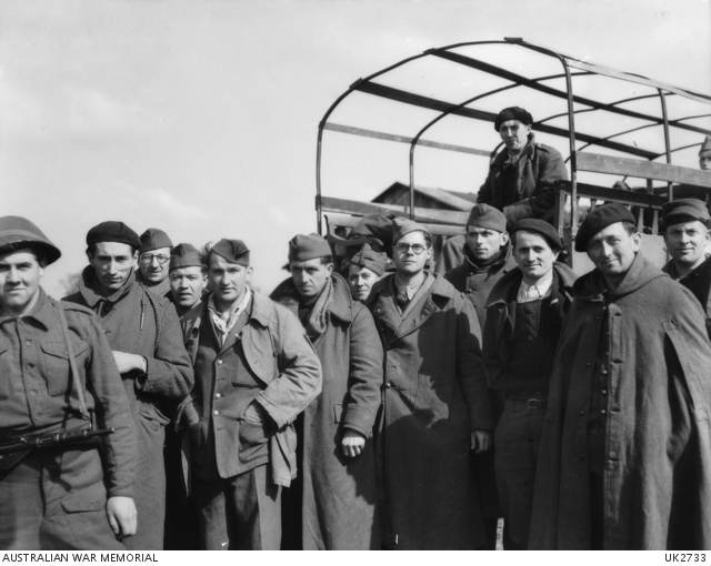 Munster. Informal group portrait of released French prisoners of war at ...