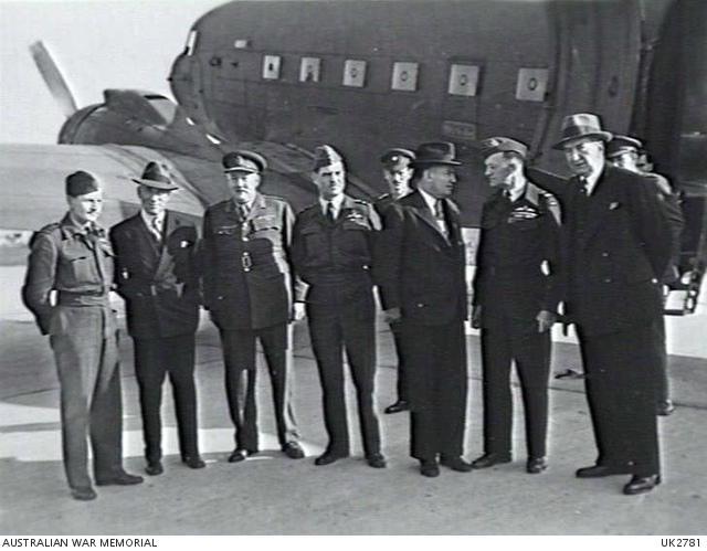 Informal group portrait taken during a visit to 464 (Mosquito) Squadron ...