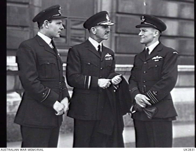 London, England. 1945-05-01. Three RAAF members after receiving their ...