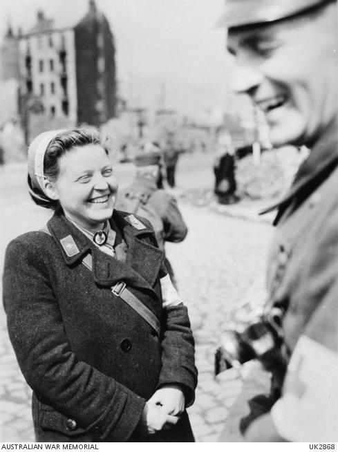 Hamburg, Germany. C. 1945-05. A German nurse and medical orderly wait ...