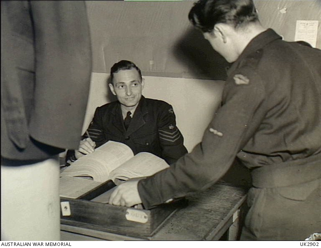 London, England. C. 1945-05. The Orderly Room Sergeant at RAAF Overseas ...