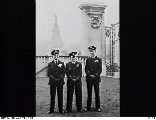 London, England. 1945-10-30. RAAF officers outside Buckingham Palace ...