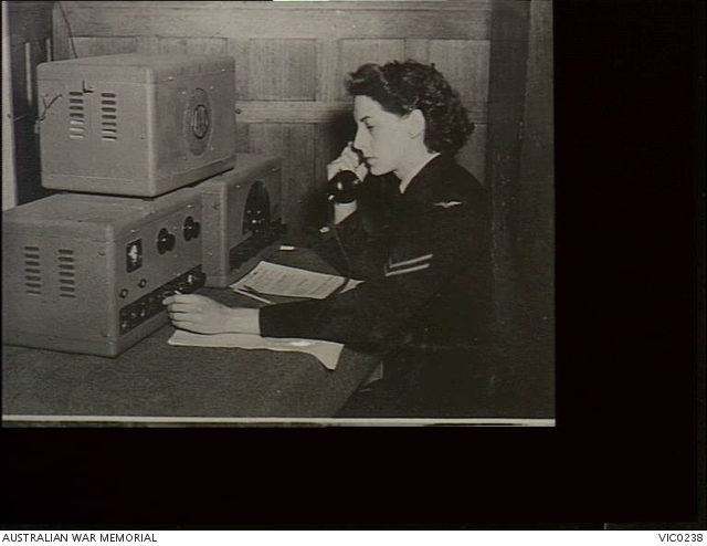 Melbourne, Vic. C. 1944-12. A WAAAF Corporal operating radio telephone ...