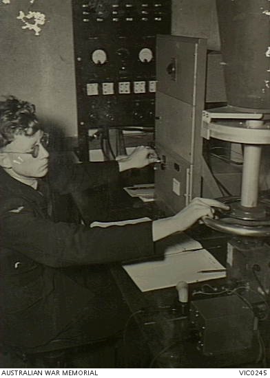 Laverton, Vic. C. 1944-12. Portrait of a radio operator taking a ...