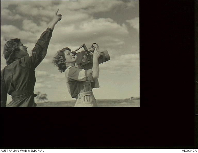 Point Cook, Vic. 1944-01-14. Two WAAAF photographers practicing with ...