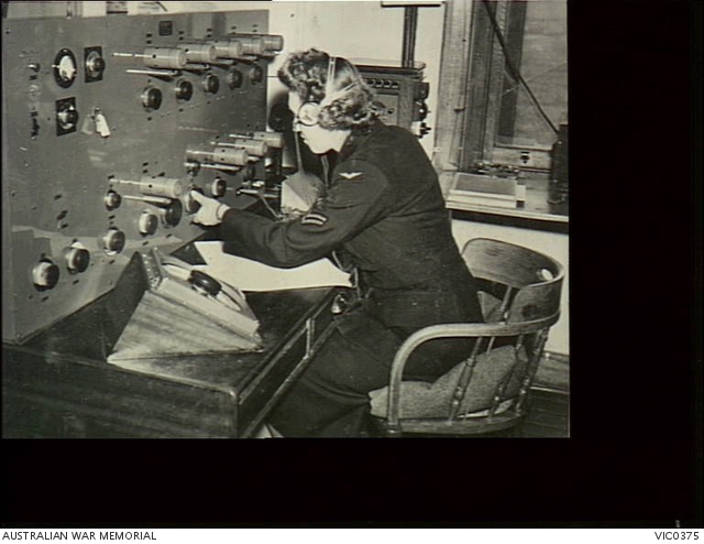 Laverton, Vic. C. 1944. A WAAAF Corporal operating Medium Frequency Direction Finding equipment ...