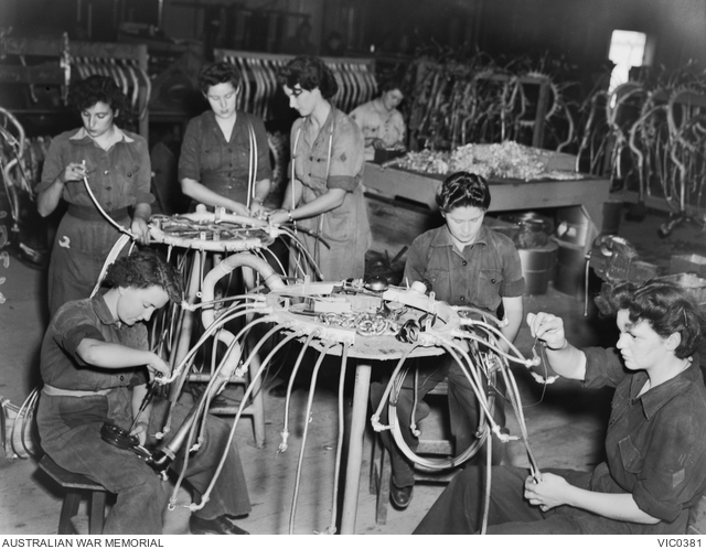 Tocumwal, NSW. C. 1944. Group of WAAAF flight mechanics assembling ...