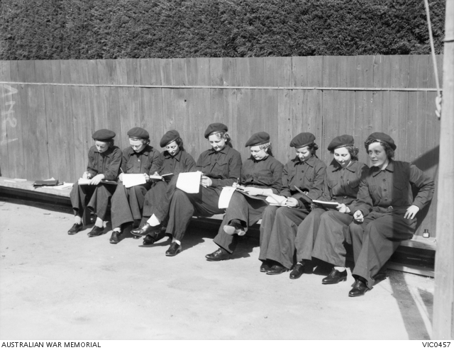 Melbourne, Vic. C. 1942. Eight WAAAF "rookies" sitting in the sun ...