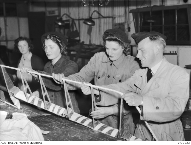 Melbourne, Vic. C. 1943. Three trainee WAAAF flight riggers working ...