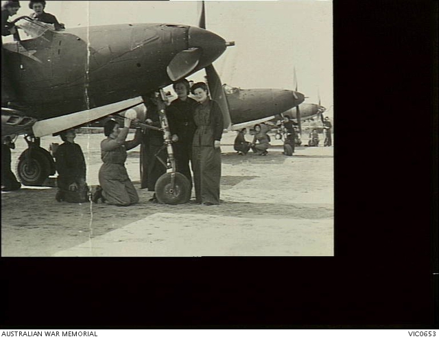 Laverton, Vic. C. 1942. Groups of WAAAF technical trainees inspect Bell ...