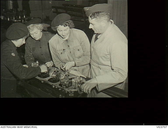 Melbourne, Vic. C. 1943. Three WAAAF trainee Flight Mechanics receiving ...