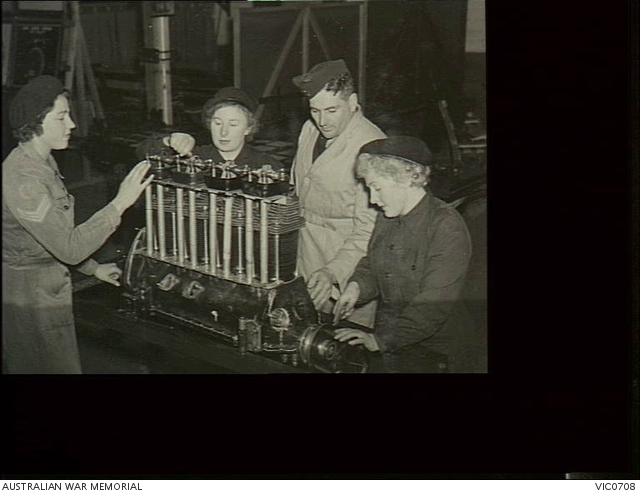 Melbourne, Vic. C. 1943. Three WAAAF trainee Flight Mechanics receiving ...