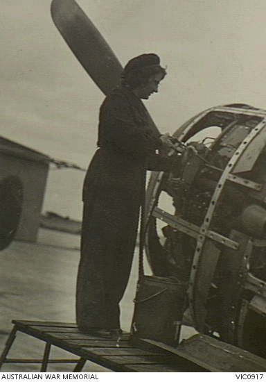 Melbourne, Vic. C. 1945-04. A WAAAF Flight Mechanic works on an ...