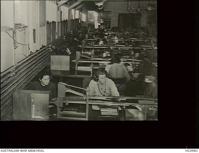 Melbourne, Vic. 1944-01-19. Rows of WAAAF radio operators at work at HQ ...
