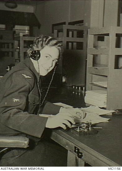 Melbourne, Vic. C. 1943. Portrait of a WAAAF Telegraphist operating a ...