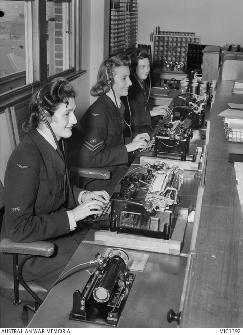 Melbourne, Vic. C. 1943. WAAAF telegraphists operating coding machines ...
