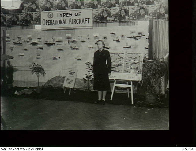 Melbourne, Vic. C. 1943. A WAAAF Sergeant in front of a display of ...