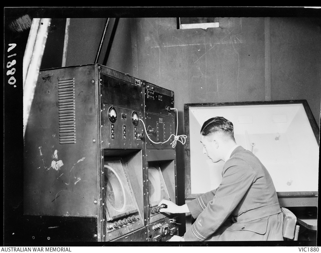 Laverton, Vic. C. 1944. A RAAF officer at the controls of a ground ...