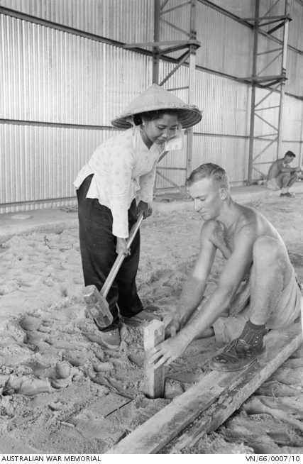 Aircraftman (AC) Robert James (Shorty) King of Townsville, Qld, holds a ...