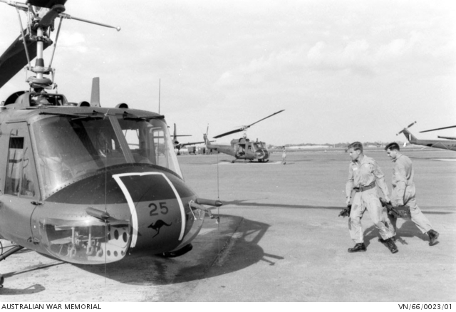 A crewman and gunner of No 9 Squadron RAAF about to board their ...