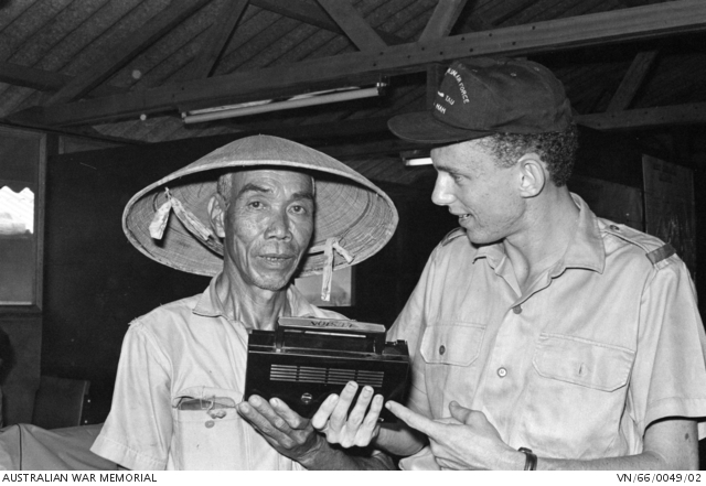 Nguyen Van Tran (left) likes working for the RAAF based at Vung Tau ...
