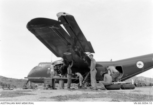 The No 35 Squadron, RAAF, Caribou being repaired in the open on the ...