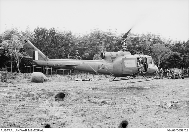 A No 9 Squadron, RAAF, Iroquois helicopter taxing above Kanga Pad at ...