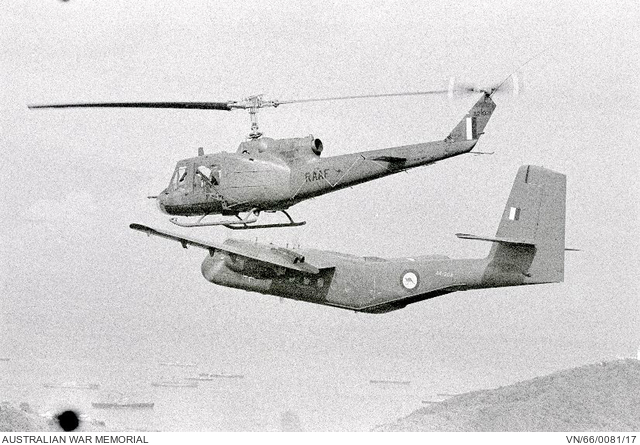 Aerial view of a No 35 Squadron, RAAF, Caribou, A4-208, and a No 9 ...