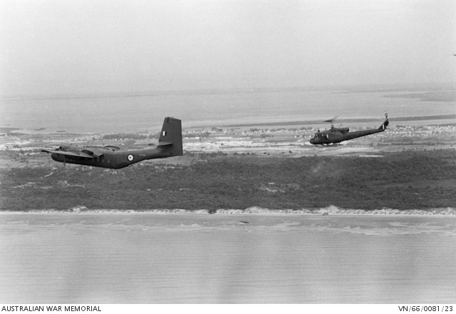 Aerial view of a No 35 Squadron, RAAF, Caribou (left) and a No 9 ...