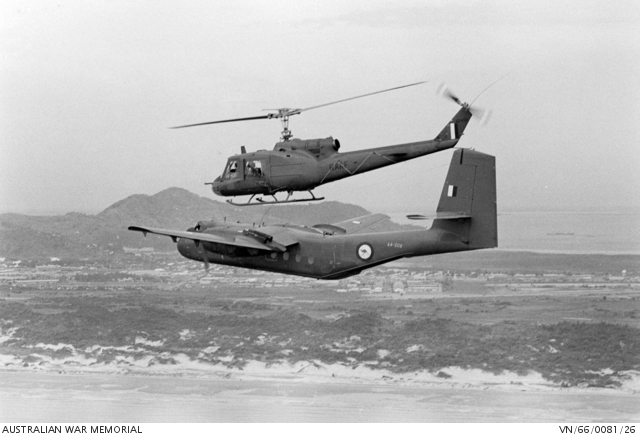 Aerial view of a No 35 Squadron, RAAF, Caribou (left) and a No 9 ...