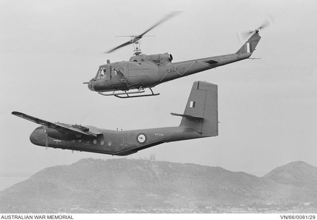 Aerial view of a No 35 Squadron, RAAF, Caribou, (front) and a No 9 ...
