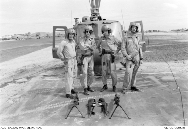 The crew of a No 9 Squadron, RAAF, Iroquois helicopter based at Vung ...
