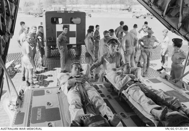 Two unidentified Australian soldiers strapped to stretchers inside a No ...
