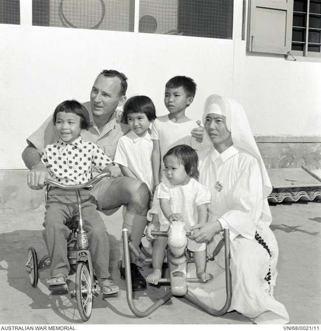 An informal group portrait of 19853 Chaplain of the Forces 3, Padre ...