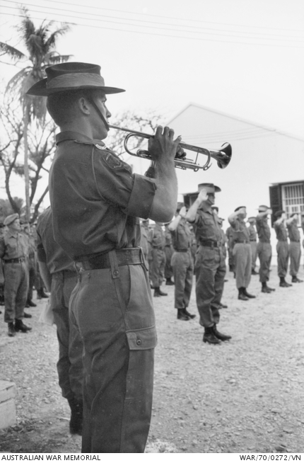 Warrant Officer Class 2 John Lefel of Mackay, Qld, plays the bugle at a ...