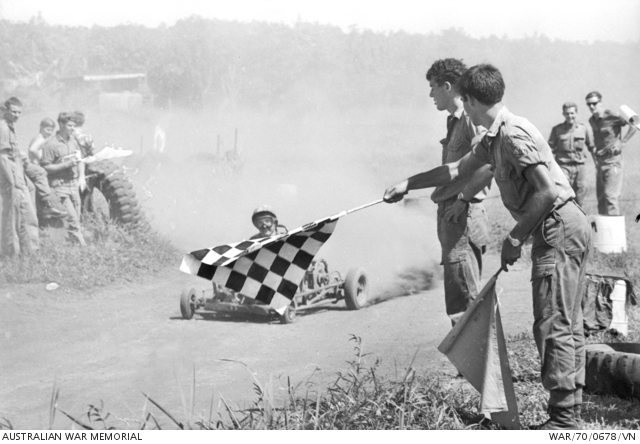 Nui Dat, South Vietnam. August 1970. The checkered flag is dropped for ...
