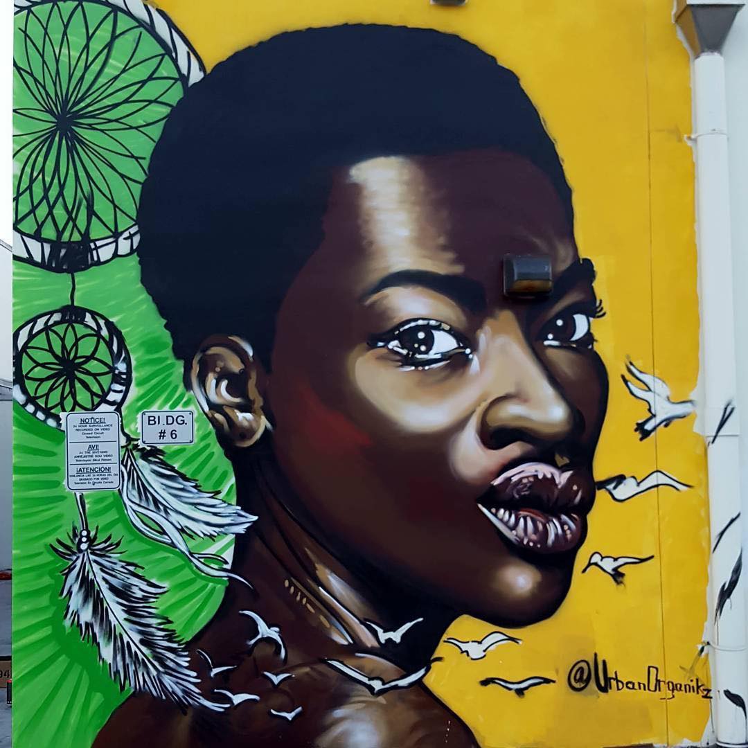 School mural portrait by Rei Ramirez in Miami