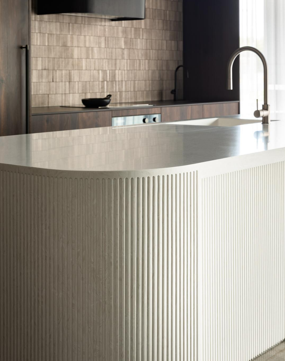 Fluted waterfall end | Corian