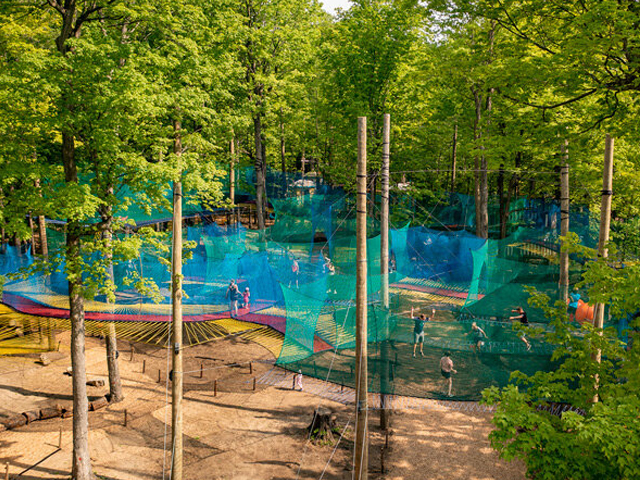 A Vibrant Outdoor Trampoline Park Among the Treetops - Project | ODS