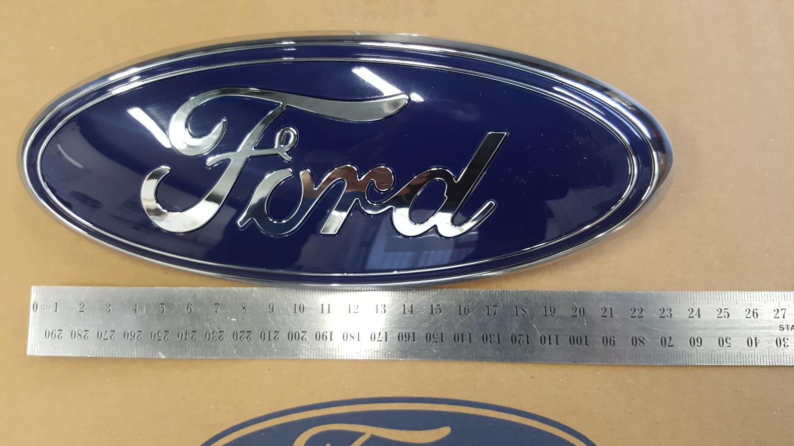 FORD TRANSIT VM 09/2006-11/2012 GRILLE BADGE ONLY GREY - First Auto Parts