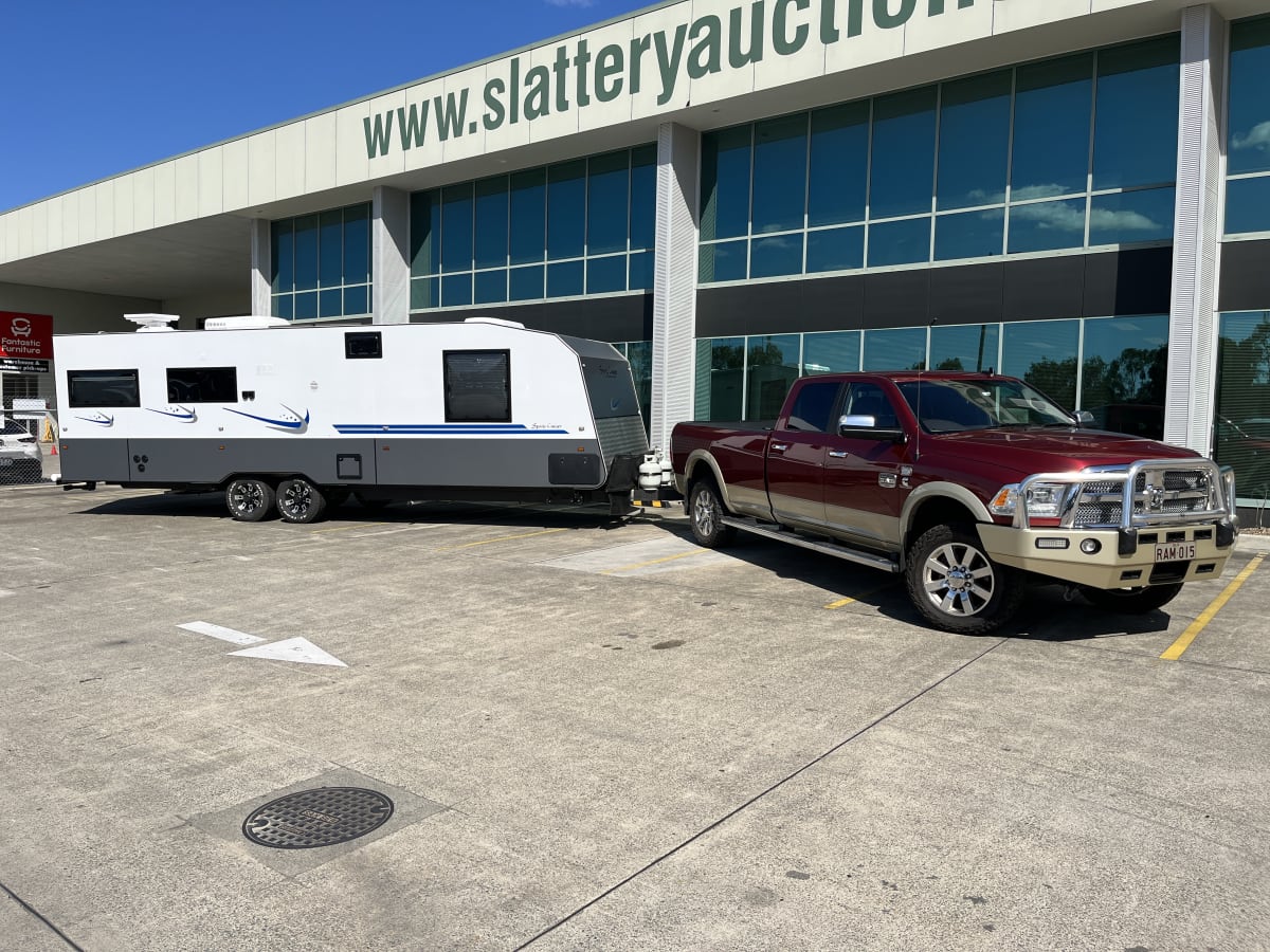 2014 Ram 2500 Longhorn & 2021 Spaceland Combo - Slattery Auctions