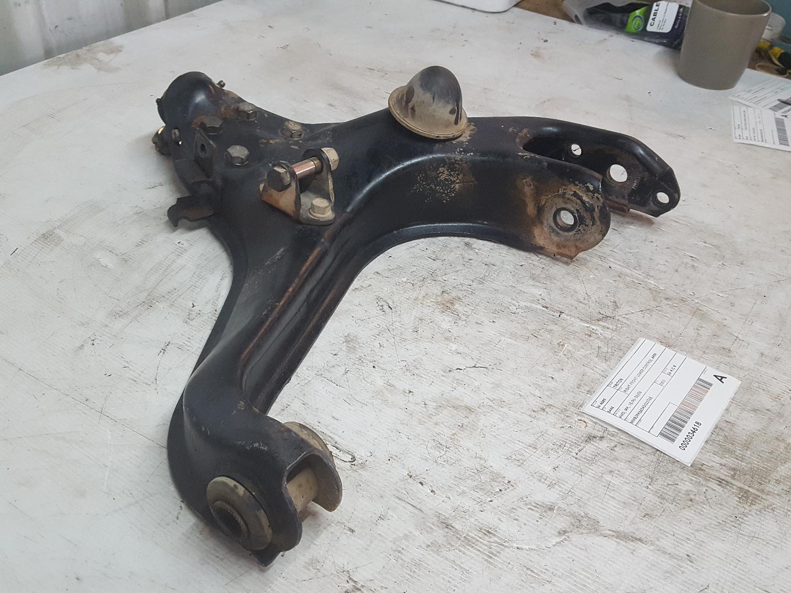Right Front Lower Control Arm Triton Mitsubishi 2003