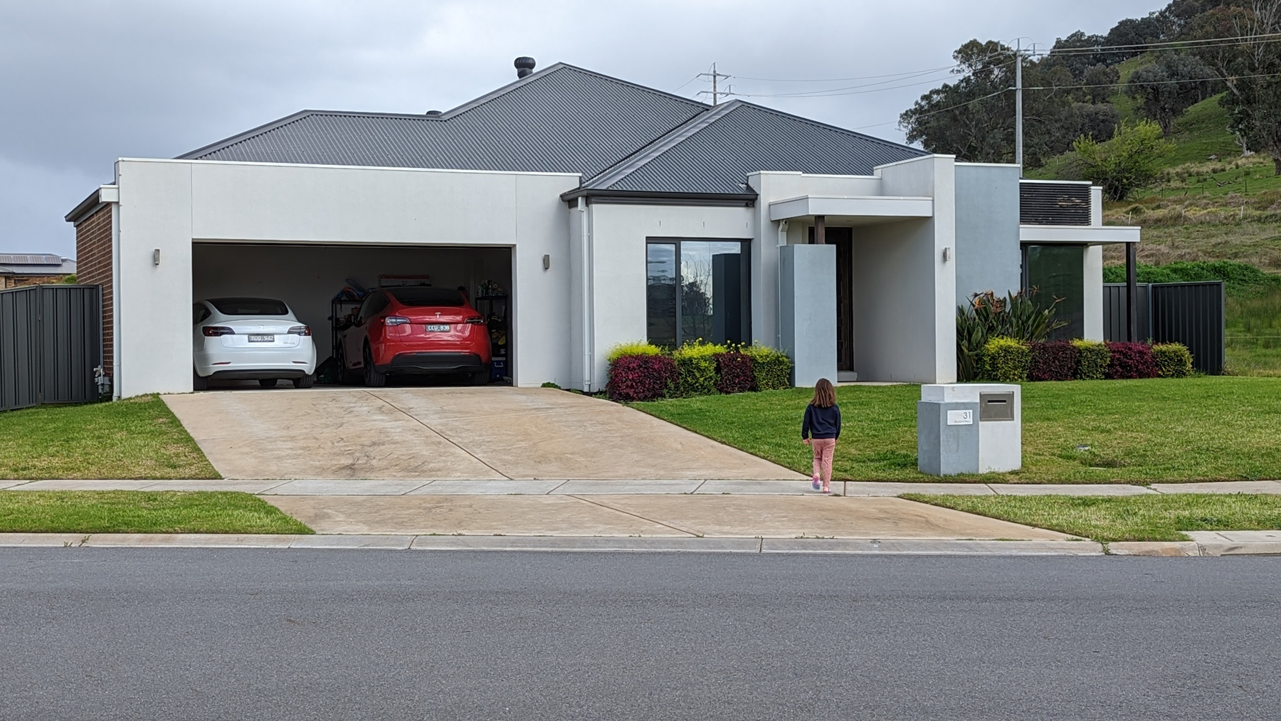 We're done with ICE. Tesla Model Y completes the all-EV garage for a ...