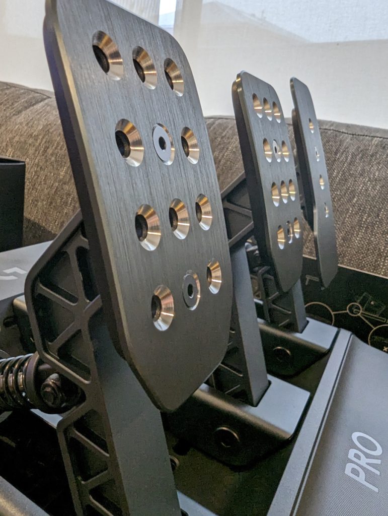 Review: Logitech's Pro Racing Wheel and Pedals make sim racing feel ...