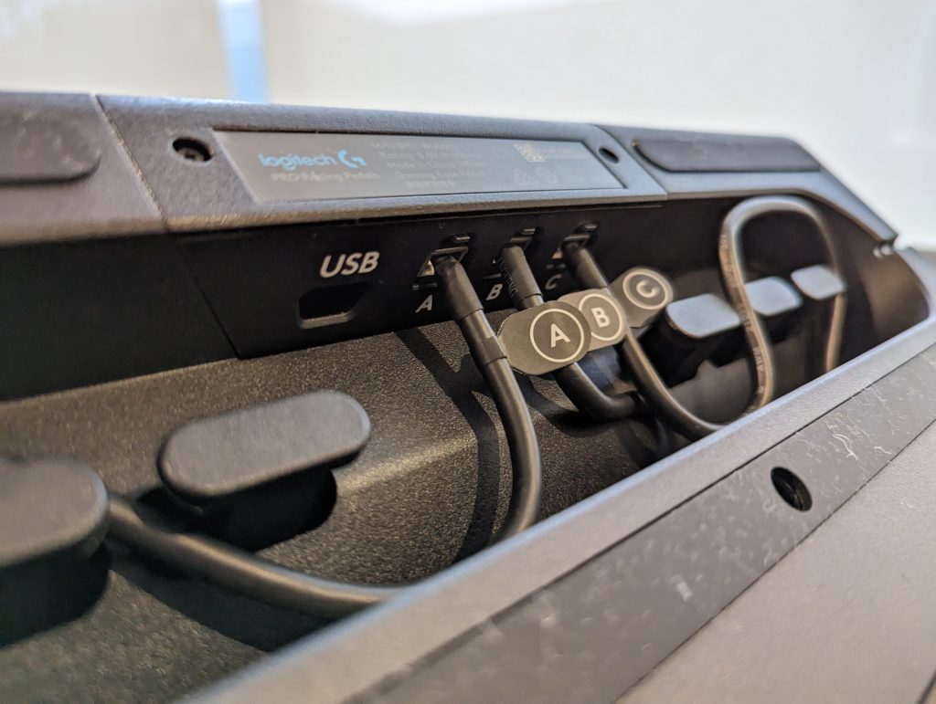 Review: Logitech's Pro Racing Wheel and Pedals make sim racing feel ...